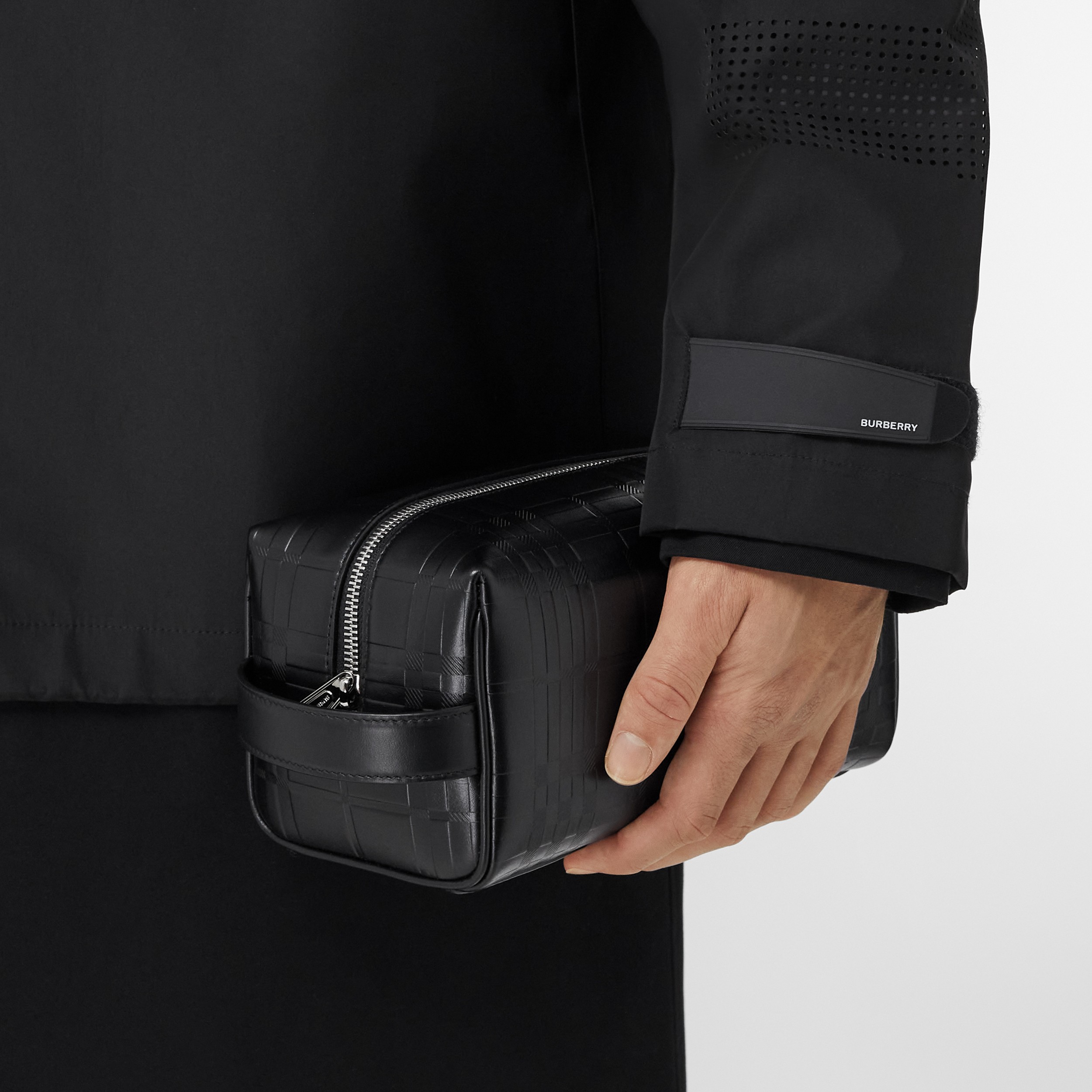 Embossed Check Leather Travel Pouch in Black - Men | Burberry® Official Embossed Check Leather Travel Pouch in Black - Men | Burberry® Official